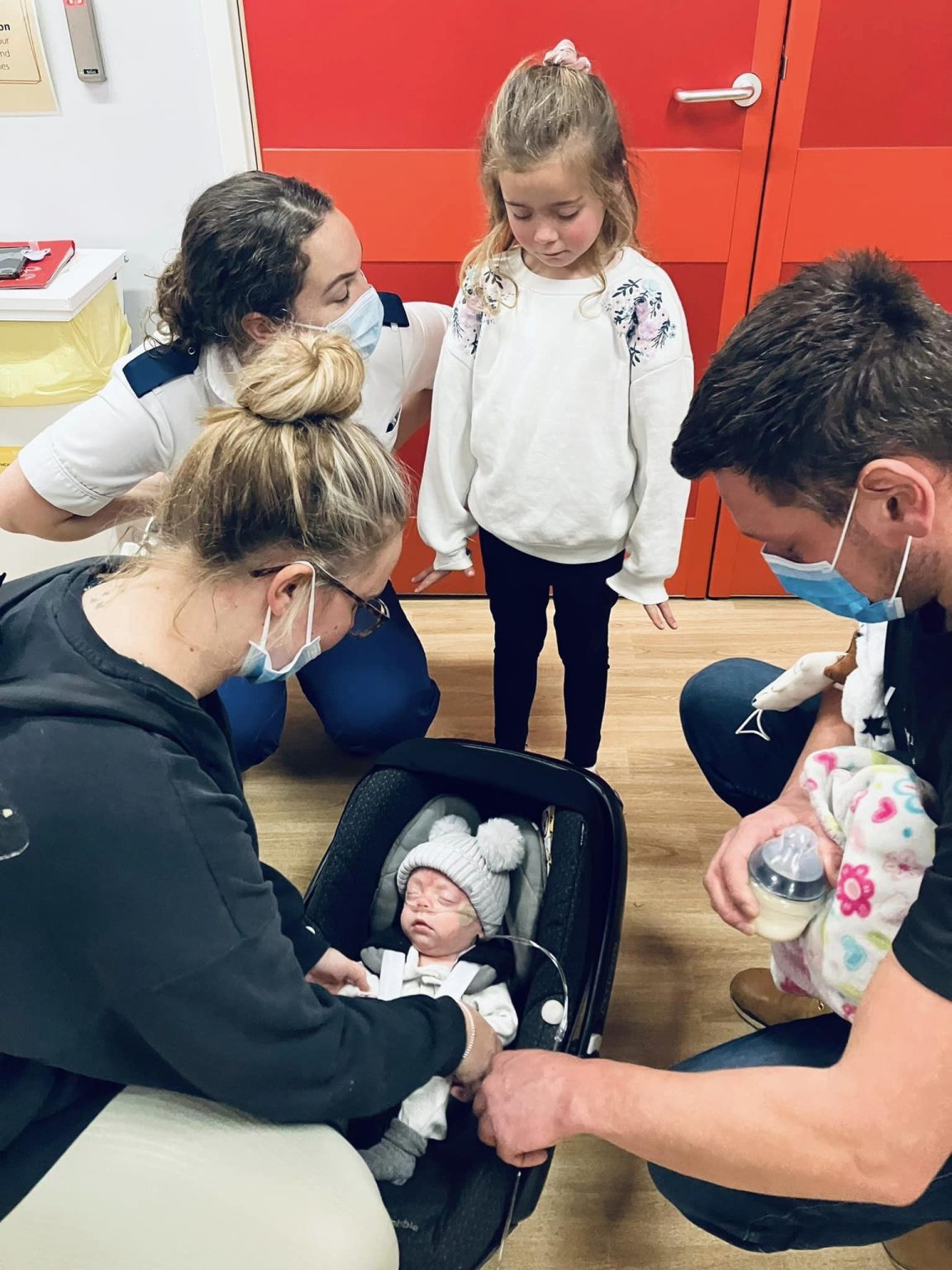 Noah Hall with his parents, Casey and Lee Hall, and big sister Ellie ...